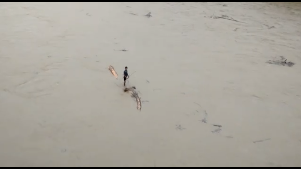 Viral Video: Man seen riding a log at Lukha river in East Jaiñtia Hills ...